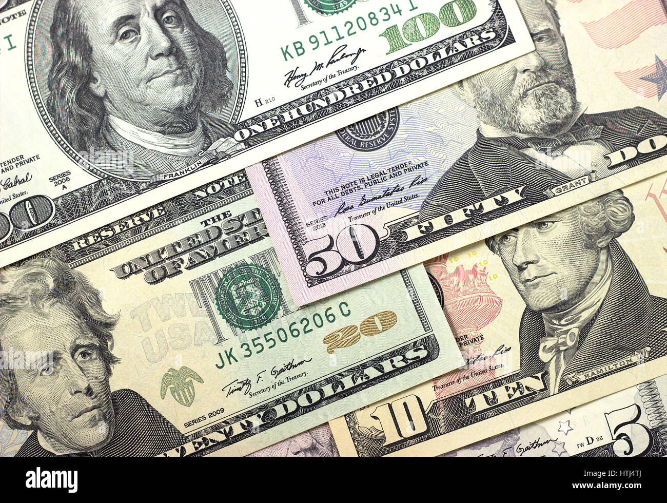 Abstract dollar bills of different denominations background Stock Photo ...