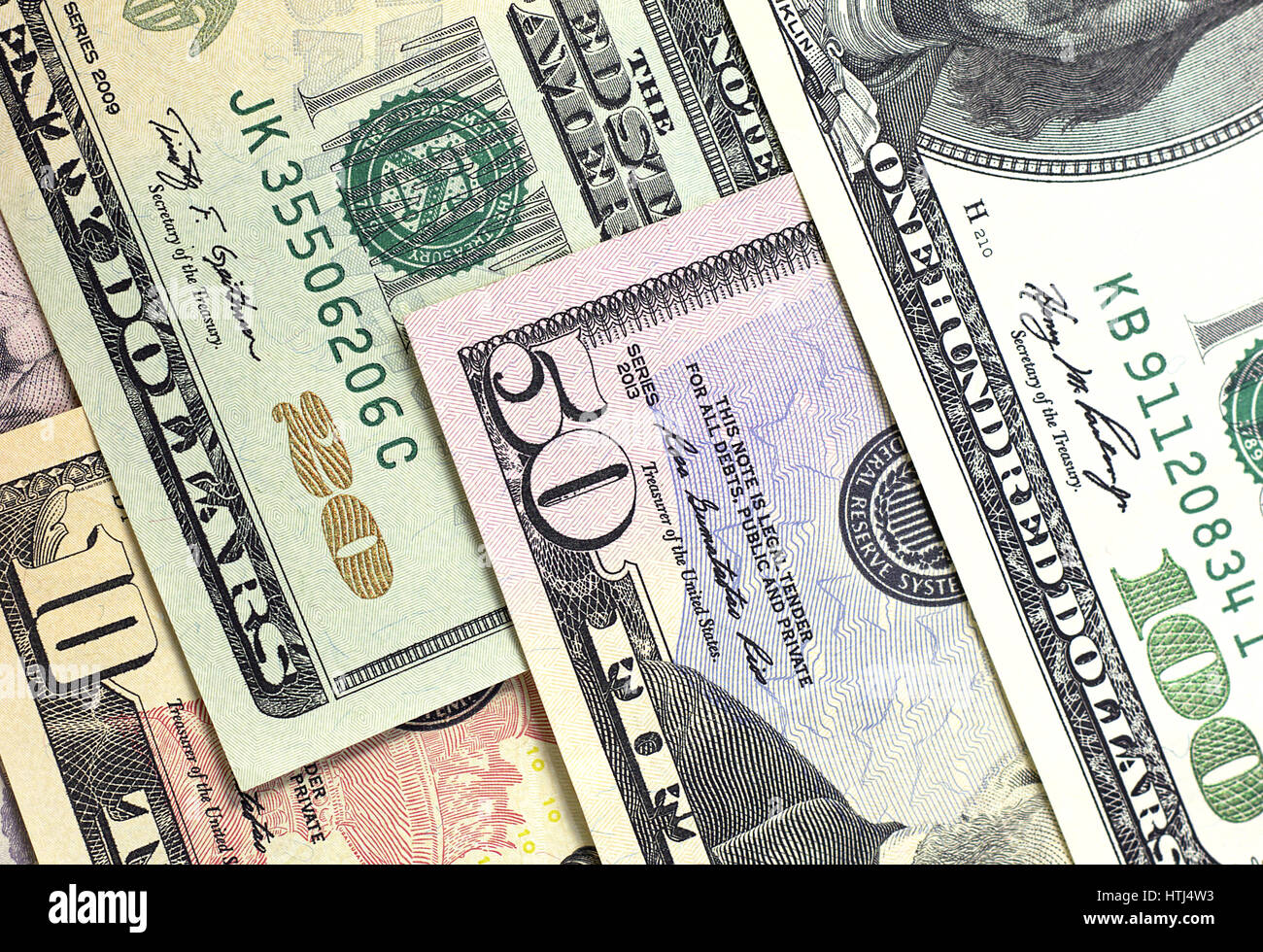 Abstract dollar bills of different denominations background Stock Photo ...