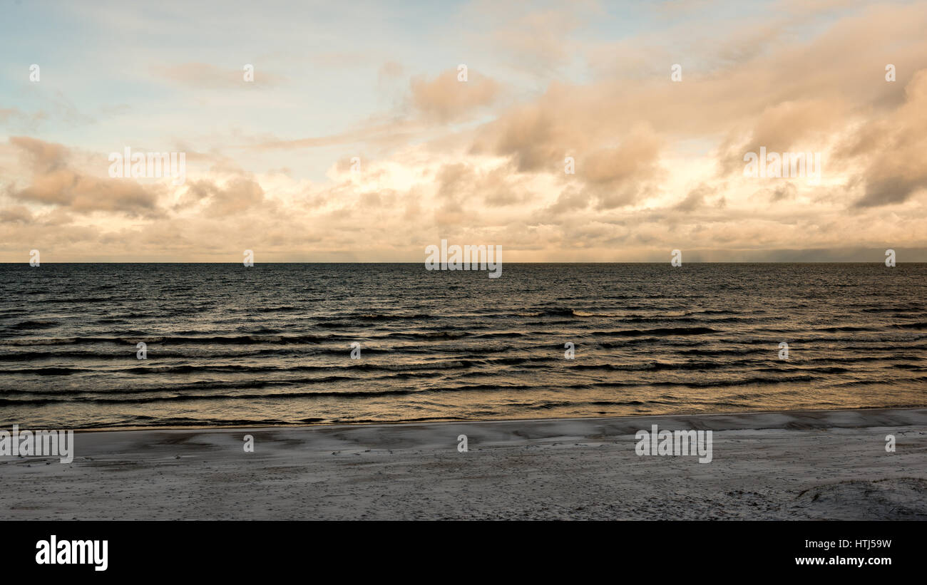 frozen countryside scene in winter with snow. beach scene with ice ...