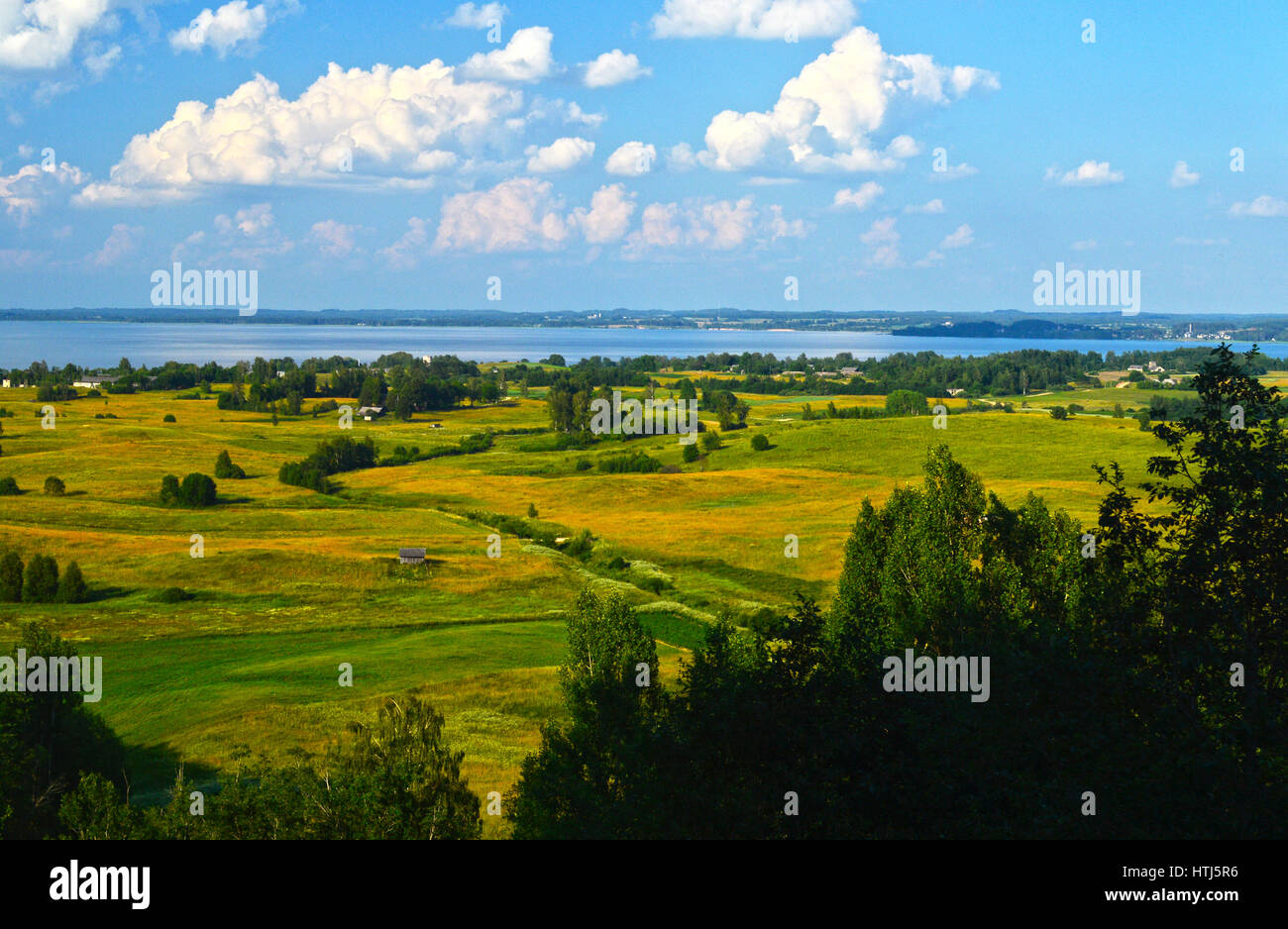 countryside fields in early spring with clouds and farmland Stock Photo ...