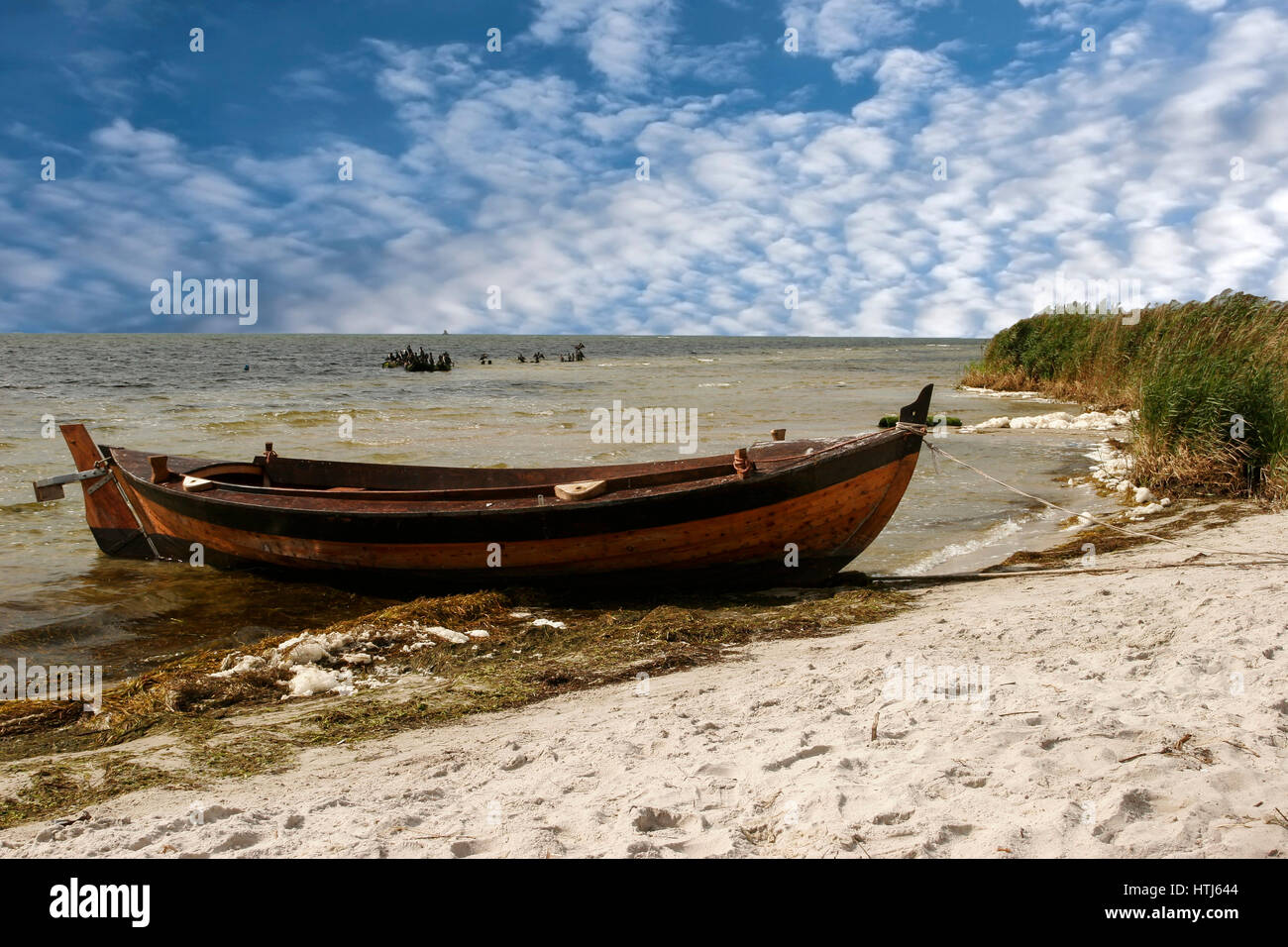 Boat on the sea shore, on the beach Stock Photo - Alamy