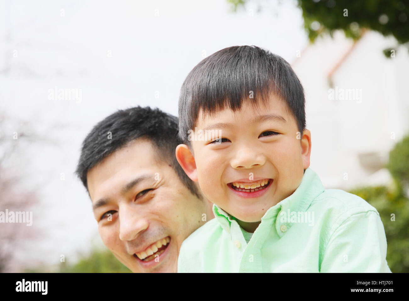 Boy looking at father in the park hi-res stock photography and images ...