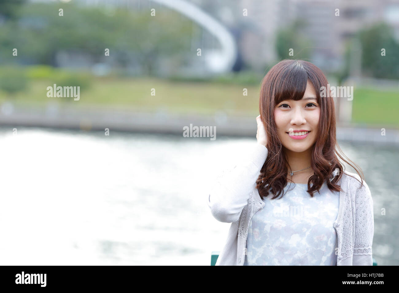 Fashionable japanese woman by river hi-res stock photography and images ...