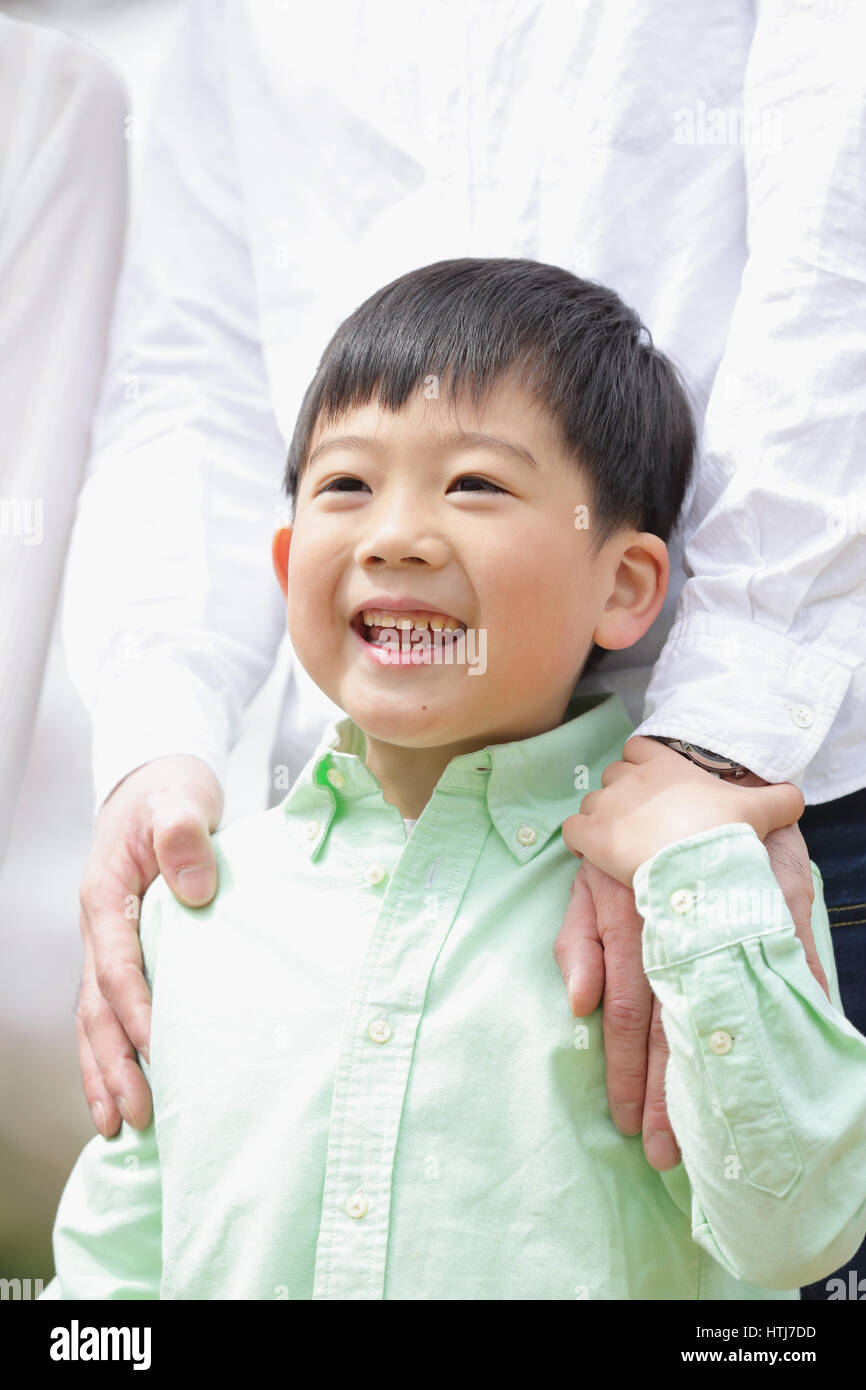Japanese father and son in a city park Stock Photo - Alamy