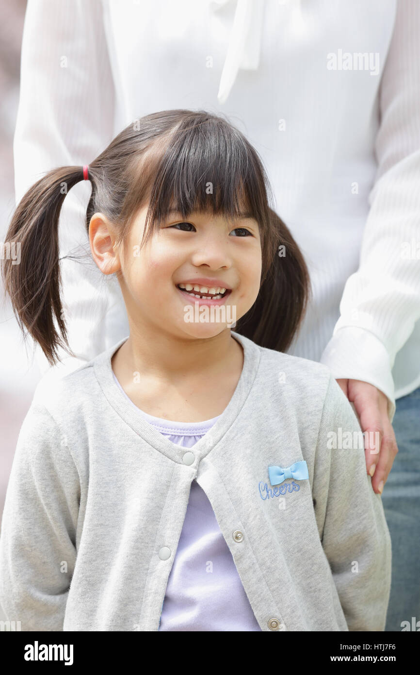 Japanese mother and daughter in a city park Stock Photo - Alamy