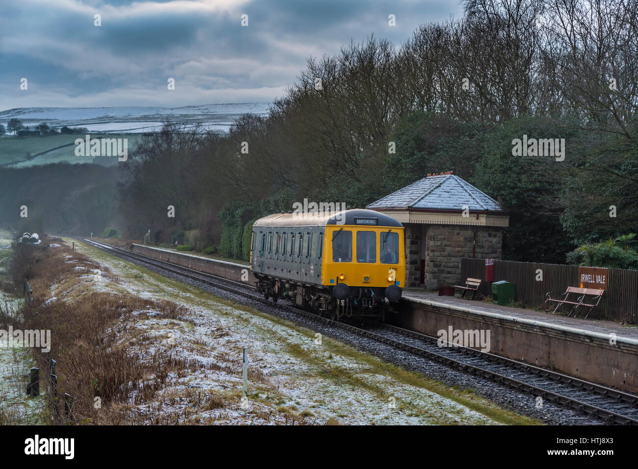 Diesel railcar Class 101 approaching Irwel Vale halt on the East ...