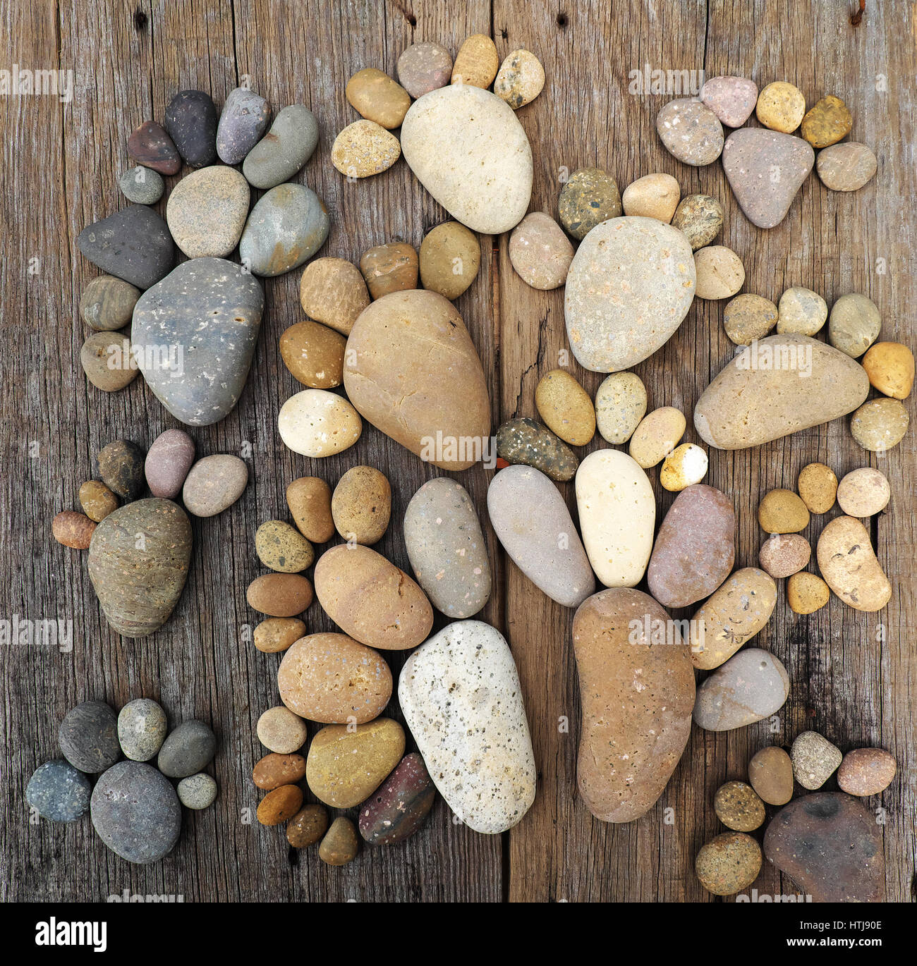 Abstract cute concept on wood background from pebbles, amazing arranged ...