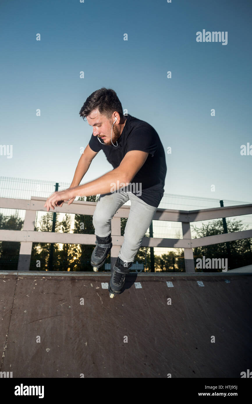 Guy rollerblading outdoors hi-res stock photography and images - Alamy