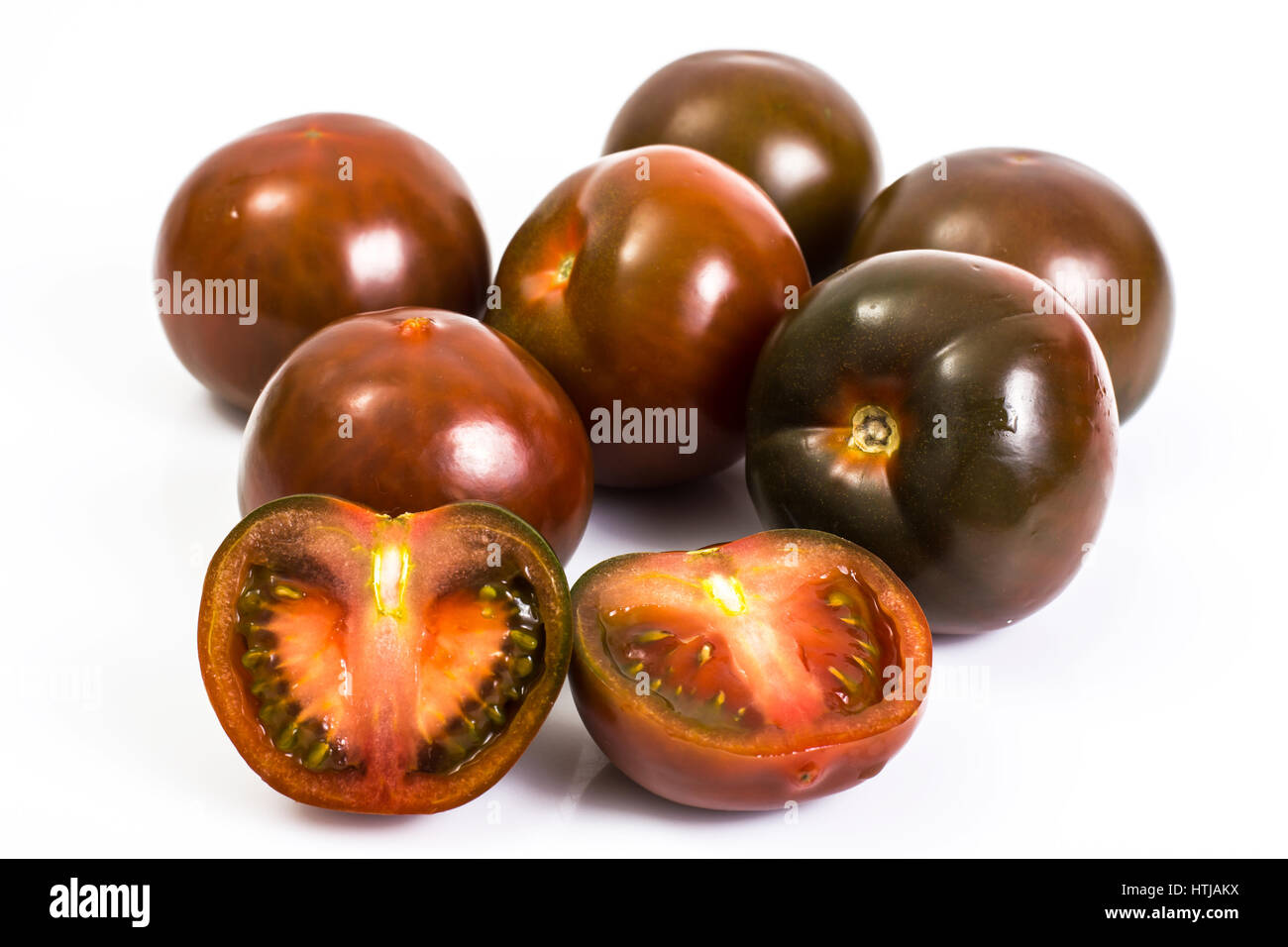 Black tomatoes Kumata. Studio Photo Stock Photo - Alamy