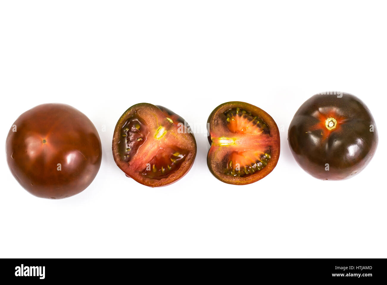 Black tomatoes Kumata. Studio Photo Stock Photo - Alamy