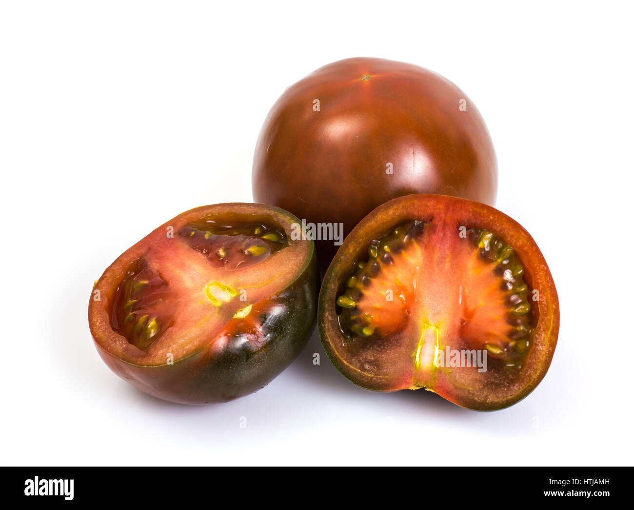 Black tomatoes Kumata. Studio Photo Stock Photo - Alamy