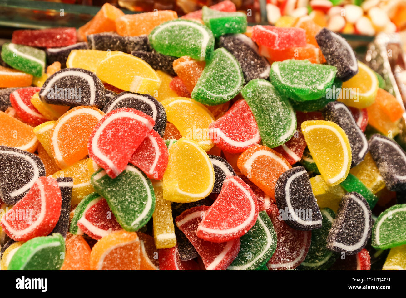 Stack of Colorful Sweets in Fruit Shape Stock Photo - Alamy