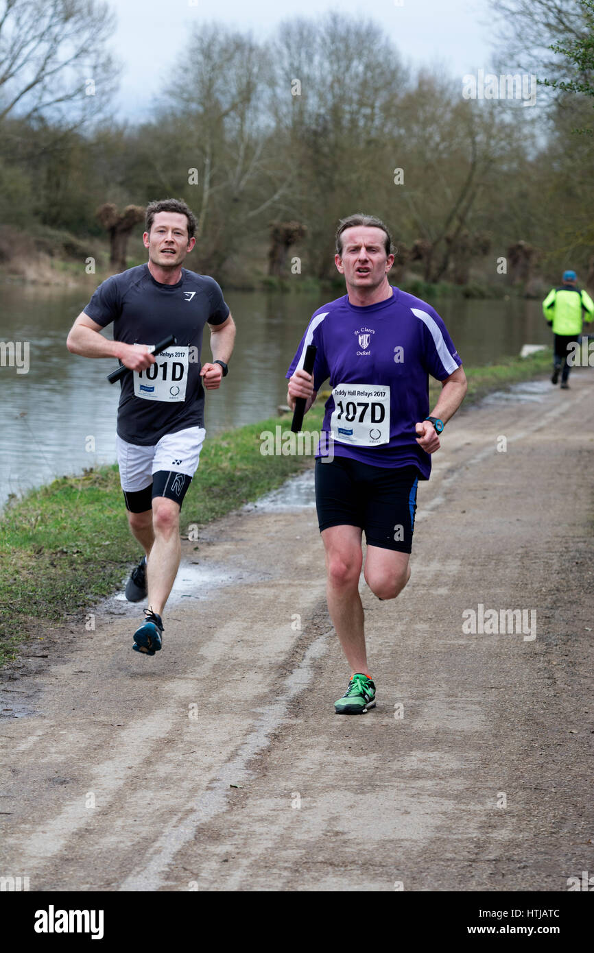 Runners on the River Thames towpath in the Teddy Hall Relays, Oxford ...