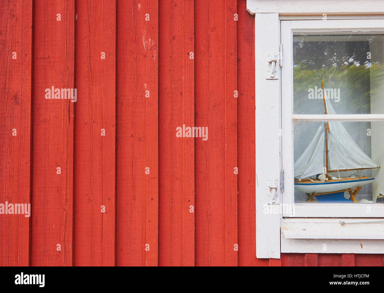 Model sailing boat in window of wooden cabin, Sweden, Scandinavia Stock ...