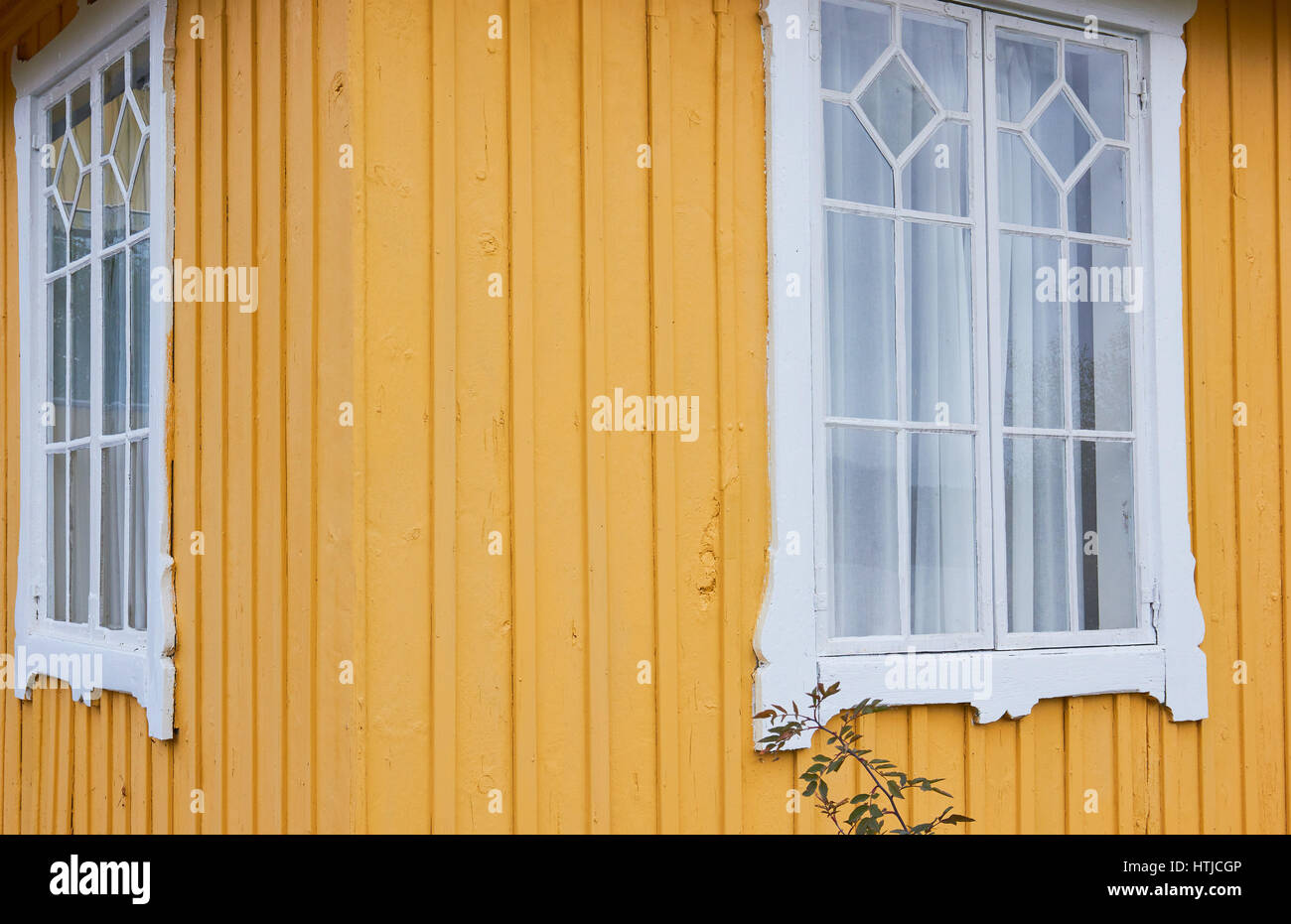 Windows of yellow painted wooden house, Sigtuna, Sweden, Scandinavia ...