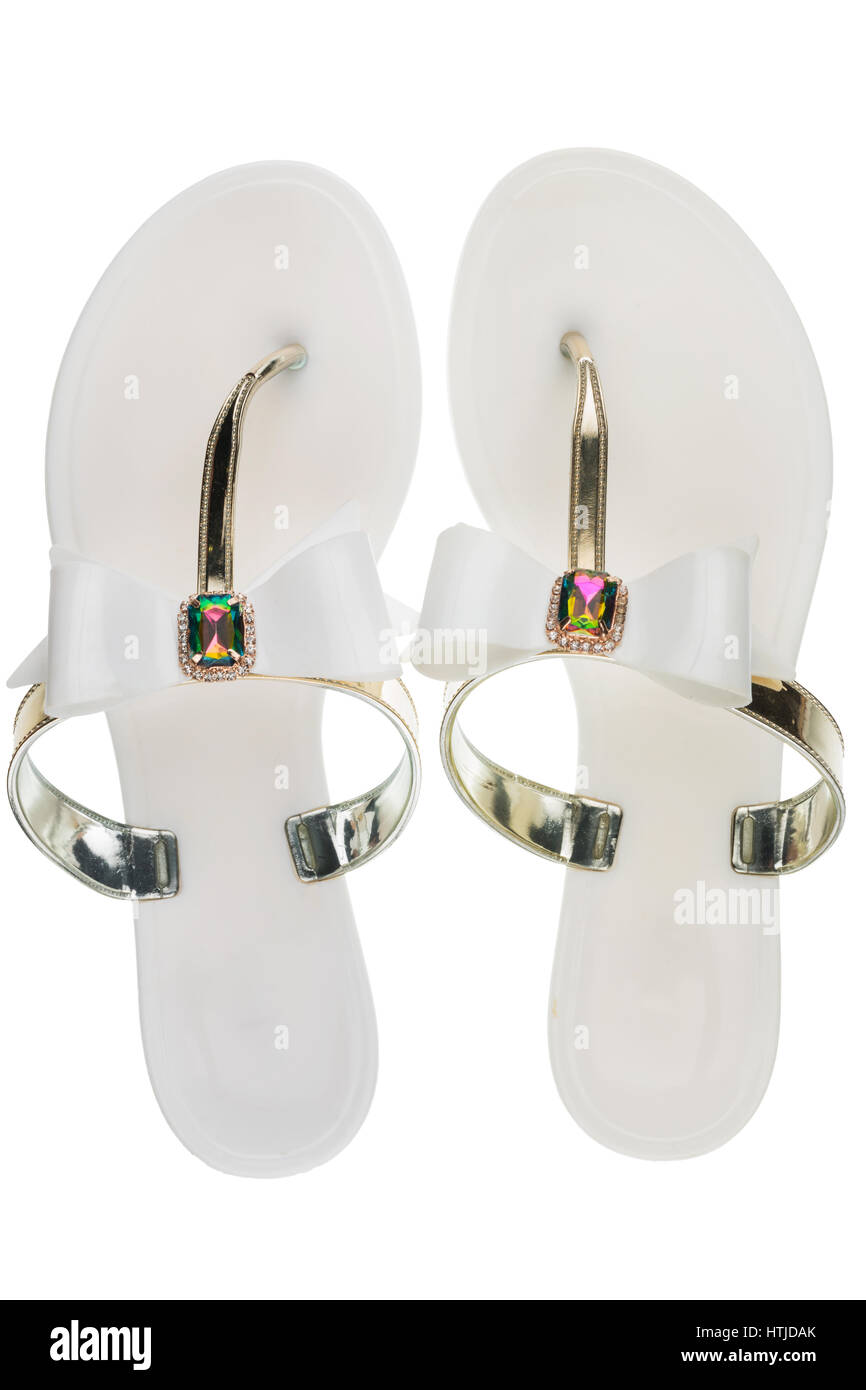 Pair of white beach sandals in rhinestones, isolated on white ...