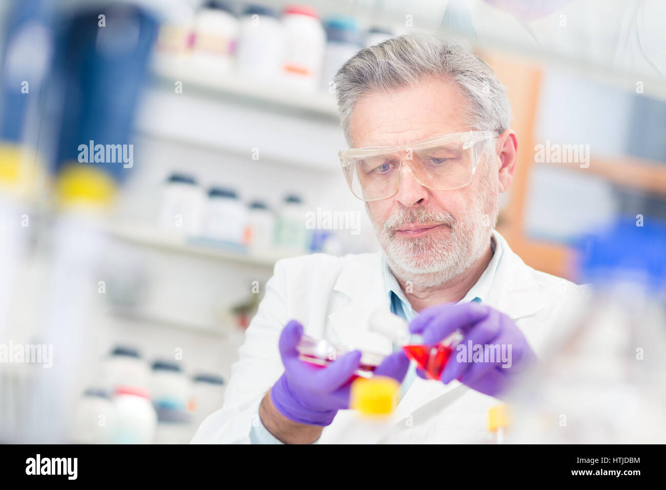 Scientist doctor in lab coat hi-res stock photography and images - Alamy