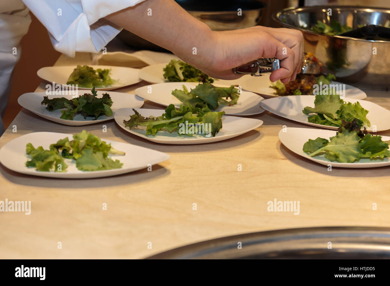Cooking inside Restaurant's Kitchen: Chef Preparing Dishes with Salad ...