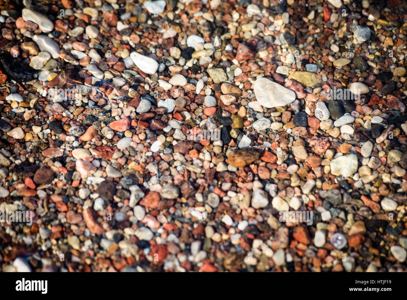 small pebble rock background texture at the beach Stock Photo - Alamy