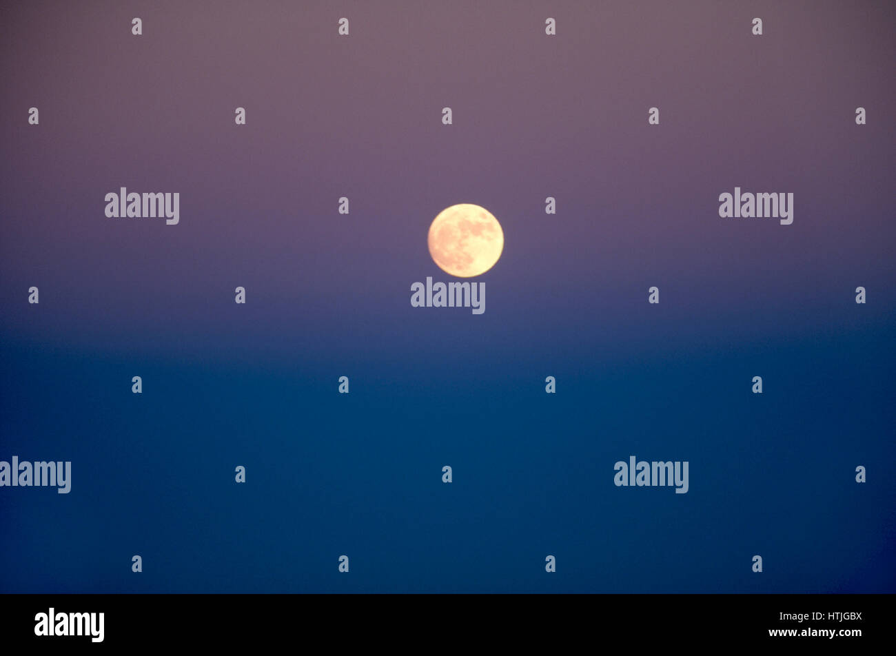 Moon in bi-color Colorado sky. The evening sky can look like this when ...