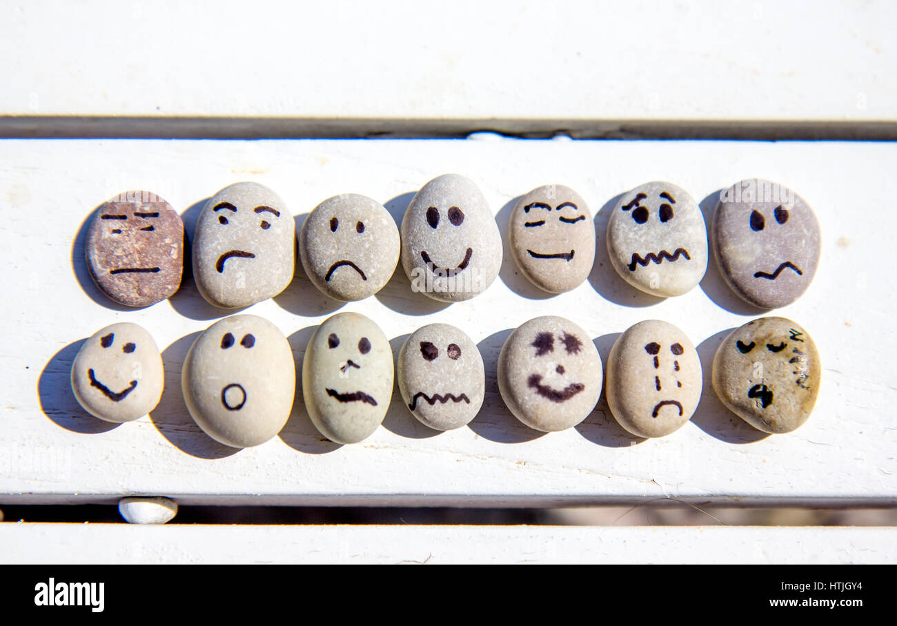 Smiley face on the pebbles Stock Photo - Alamy