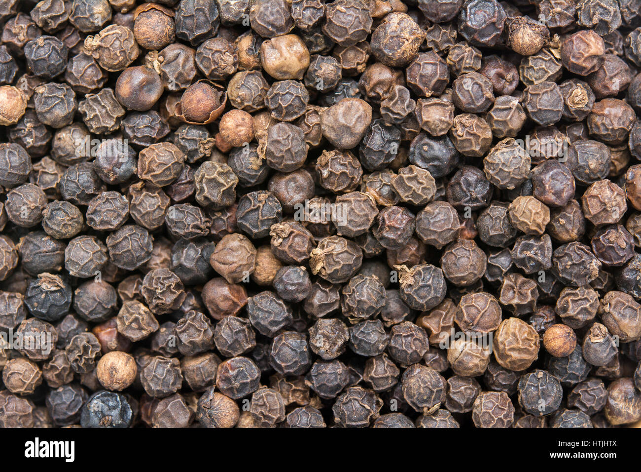 Closeup for black peppercorns texture background Stock Photo - Alamy