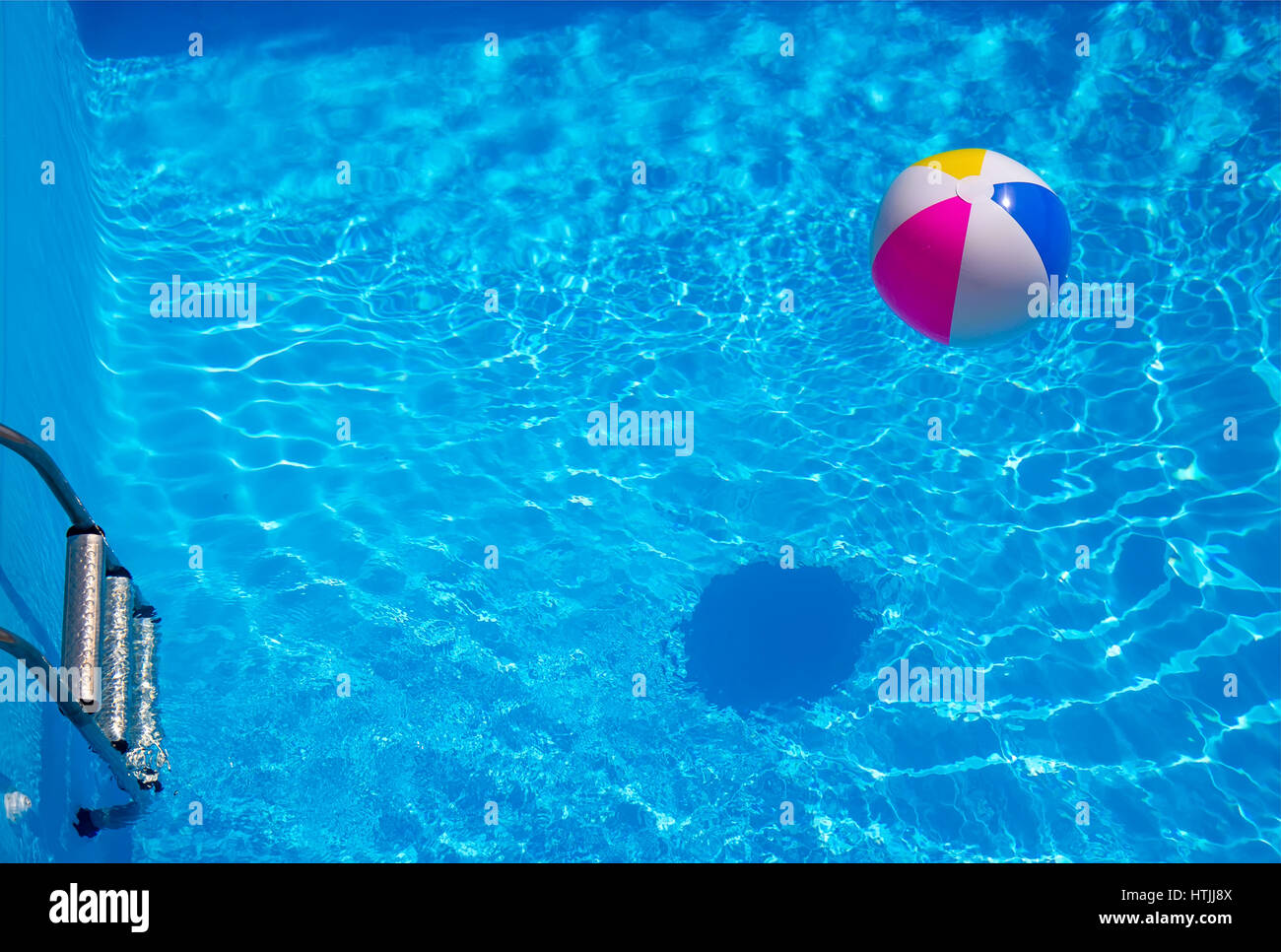 Rubber ball in the pool Stock Photo - Alamy