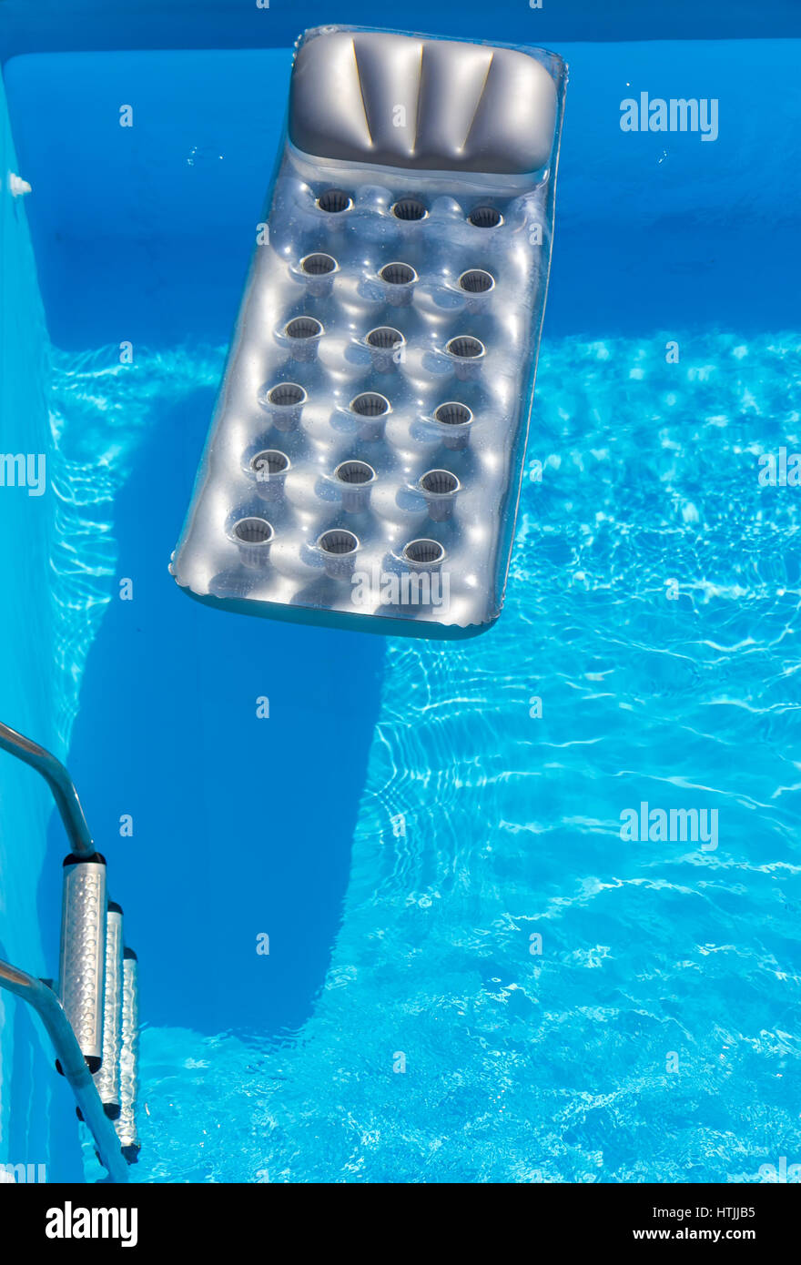 Mattress in the swimming pool Stock Photo - Alamy