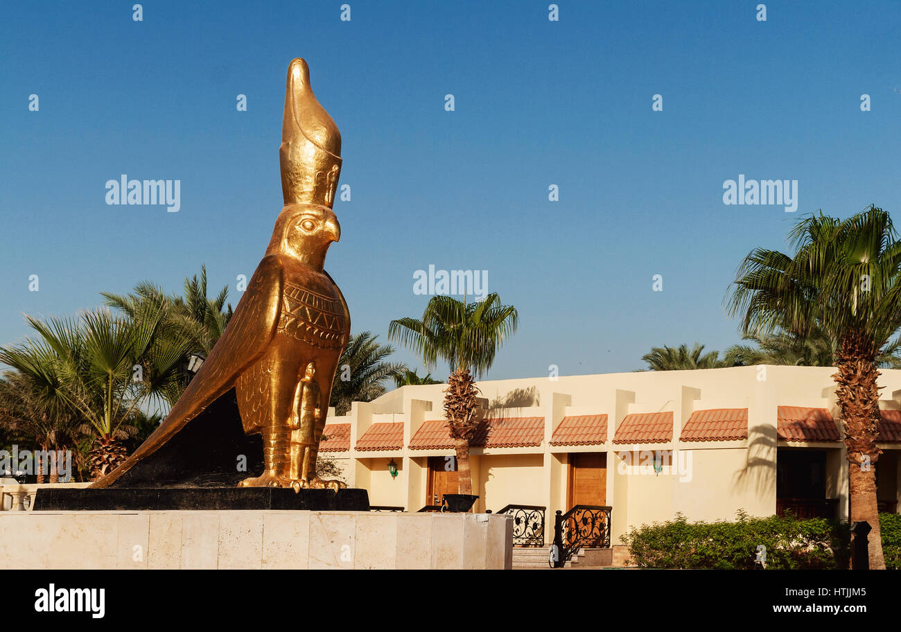 A golden statue of Horus a falcon headed by the Egyptian god of heaven ...