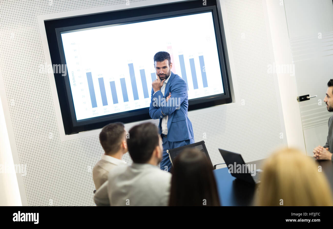 Business people having conference meeting at board room Stock Photo - Alamy