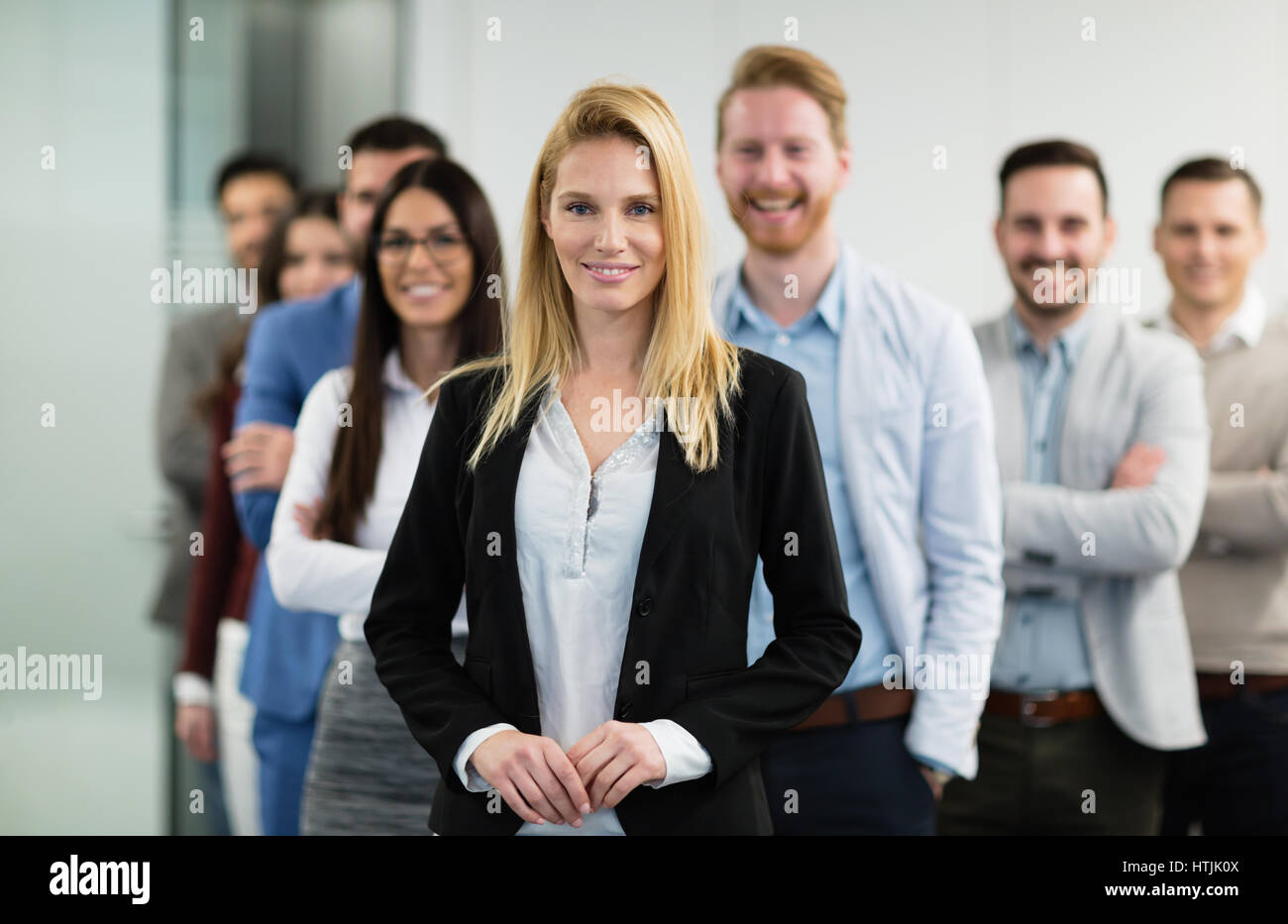 Group of happy business people and company staff Stock Photo - Alamy