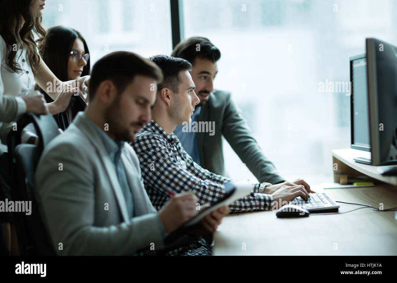 Business colleagues at information technology company offices Stock ...