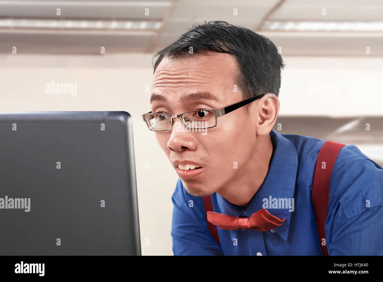 Nerdy guy computer hi-res stock photography and images - Alamy