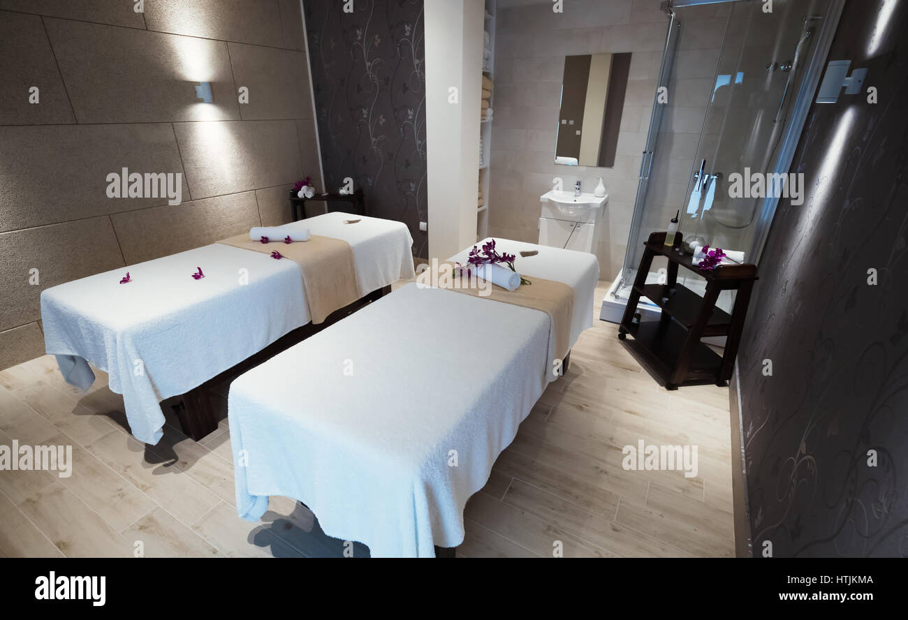 Beautiful modern massage room in spa resort Stock Photo - Alamy