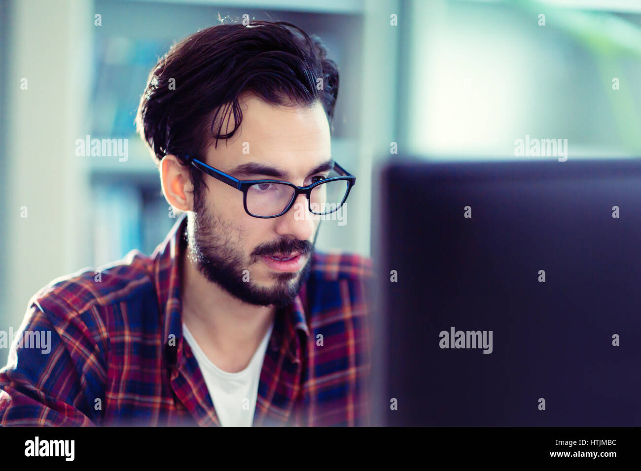 Programmer working at software developement company office Stock Photo ... Programmer working at software developement company office Stock Photo ...