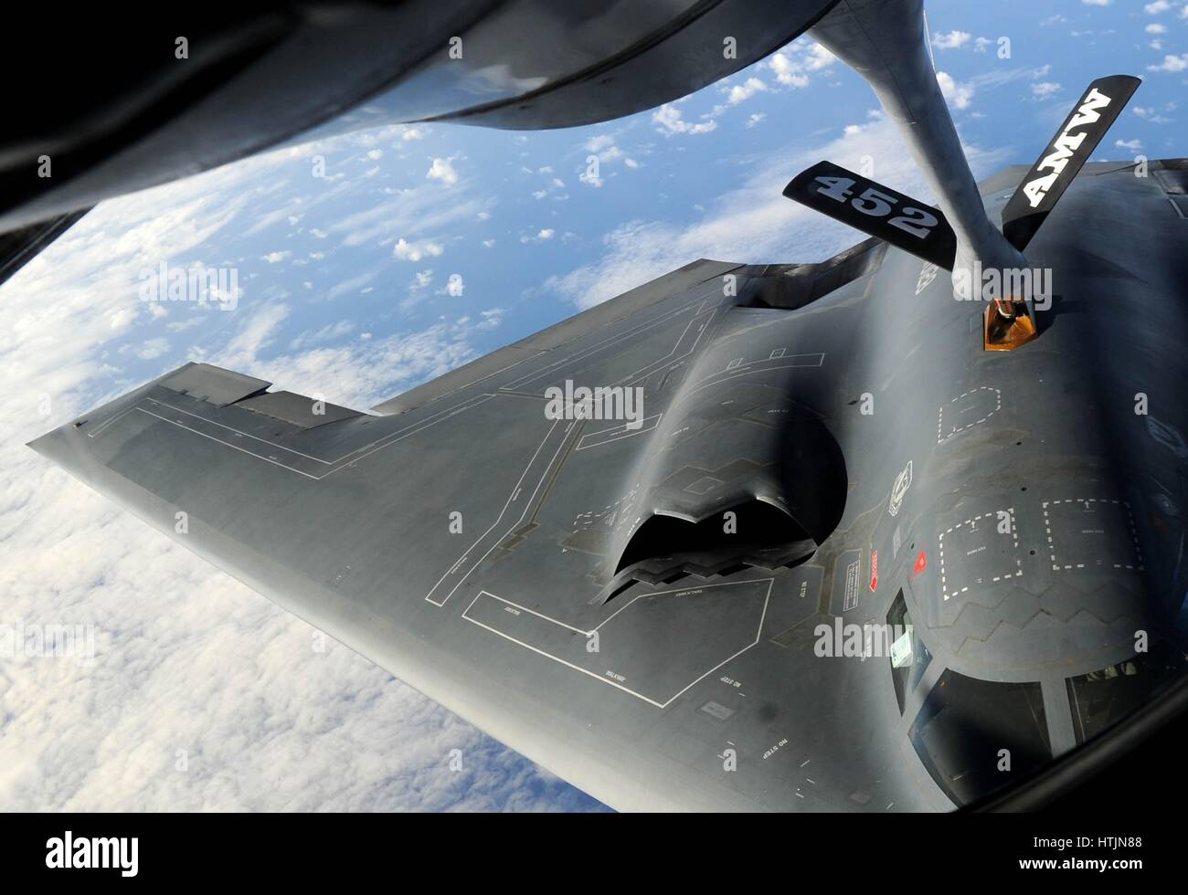 A U.S. Air Force KC-135 Stratotanker aerial refueling aircraft refuels ...