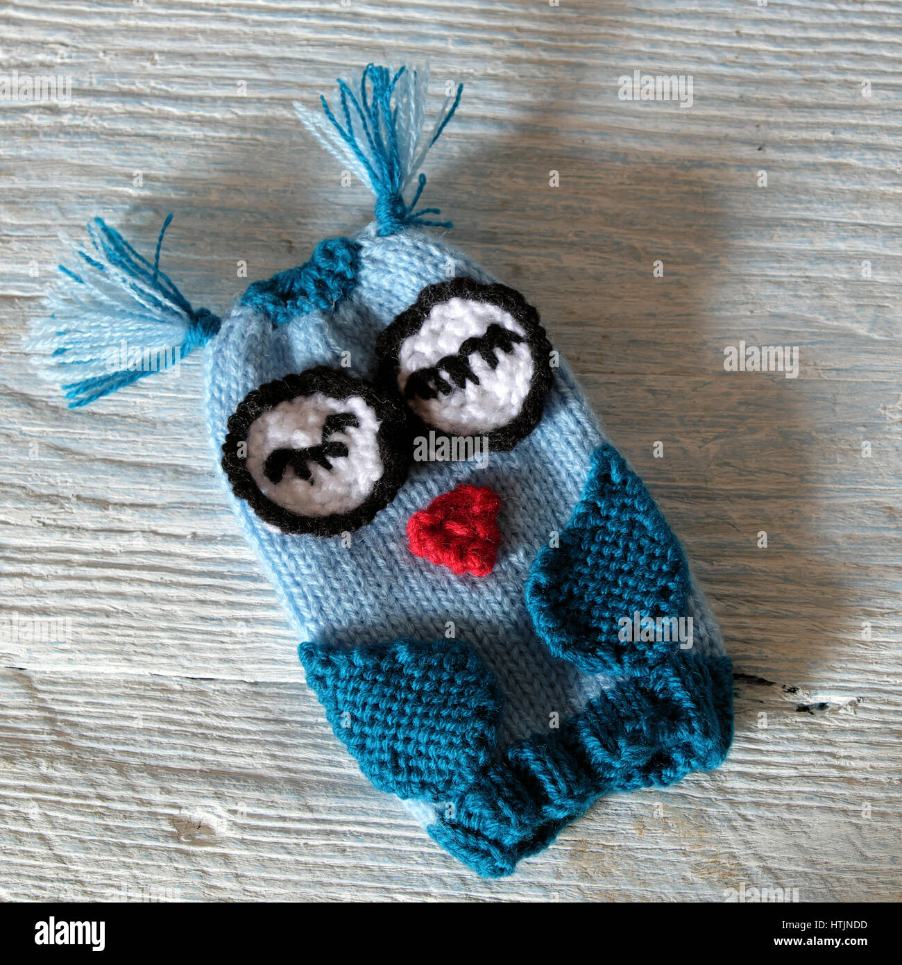 Hand puppets for children day, colorful owl puppet knit from yarn ...