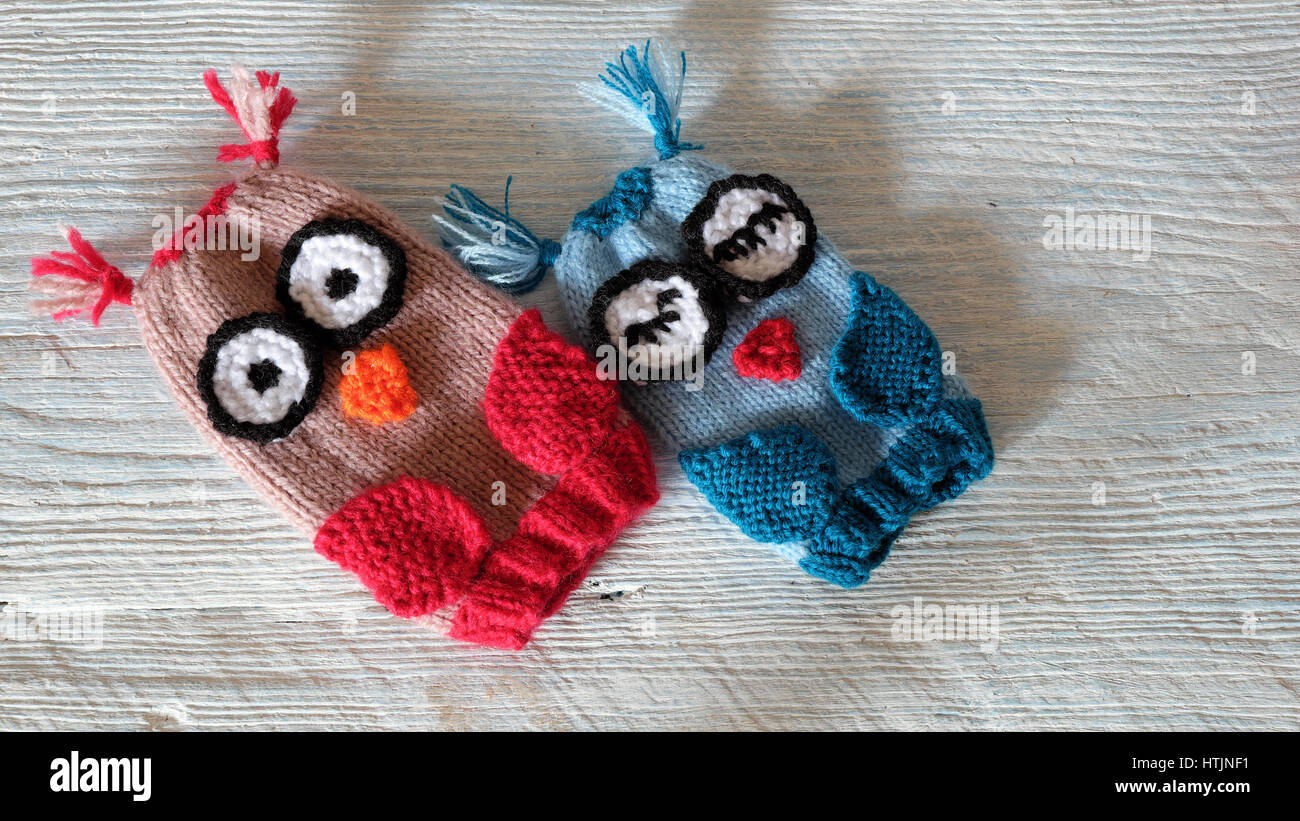Hand puppets for children day, colorful owl puppet knit from yarn ...