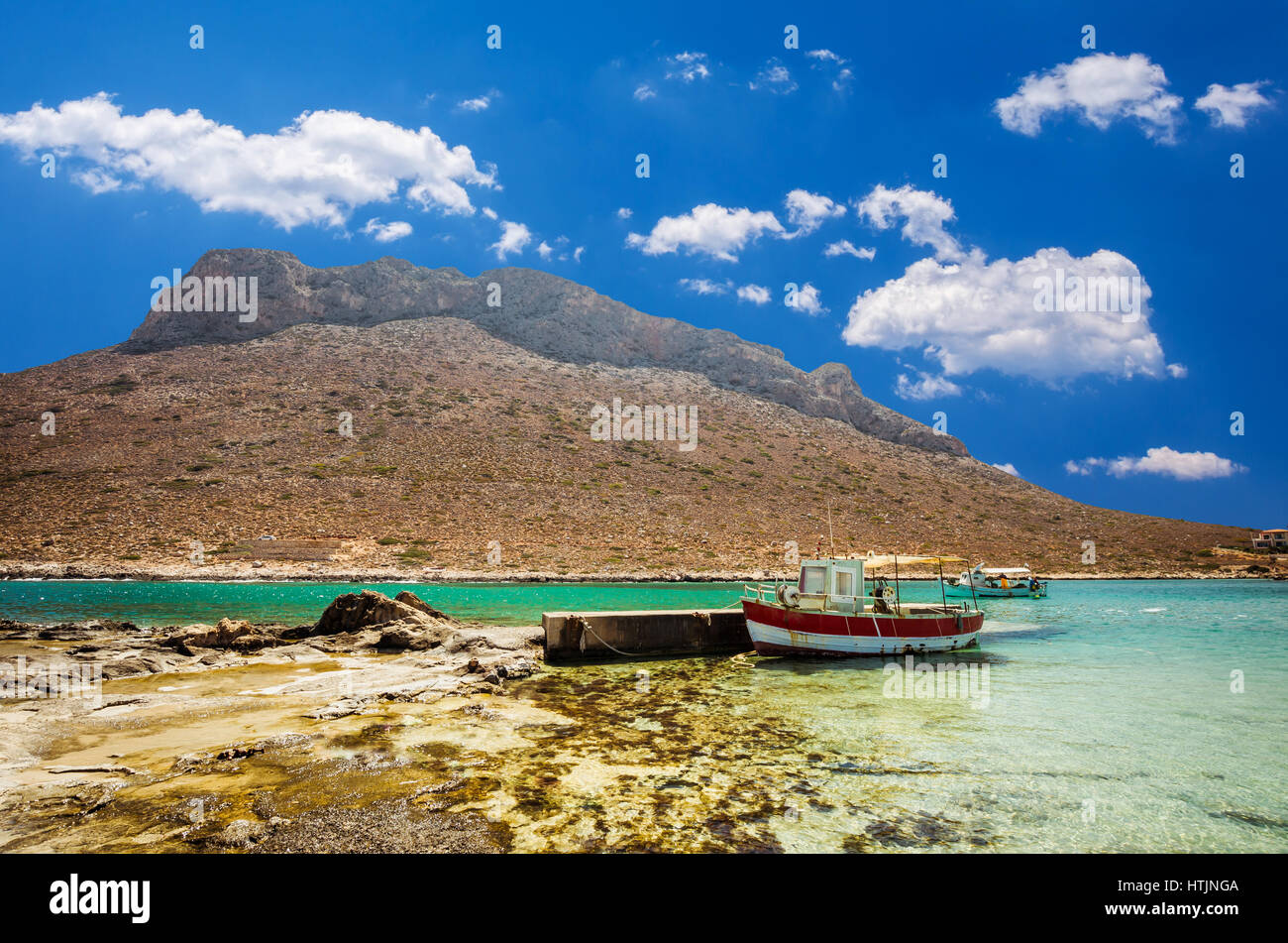 Stavros beach on Crete island, Greece. Fishing boat at Stavros bay ...