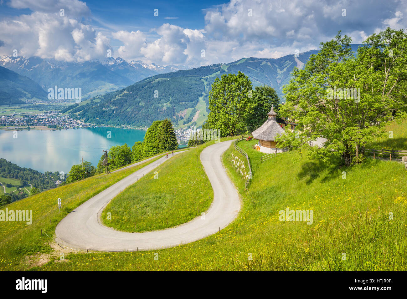 Winding mountain road in beautiful mountain scenery in the Alps in ...