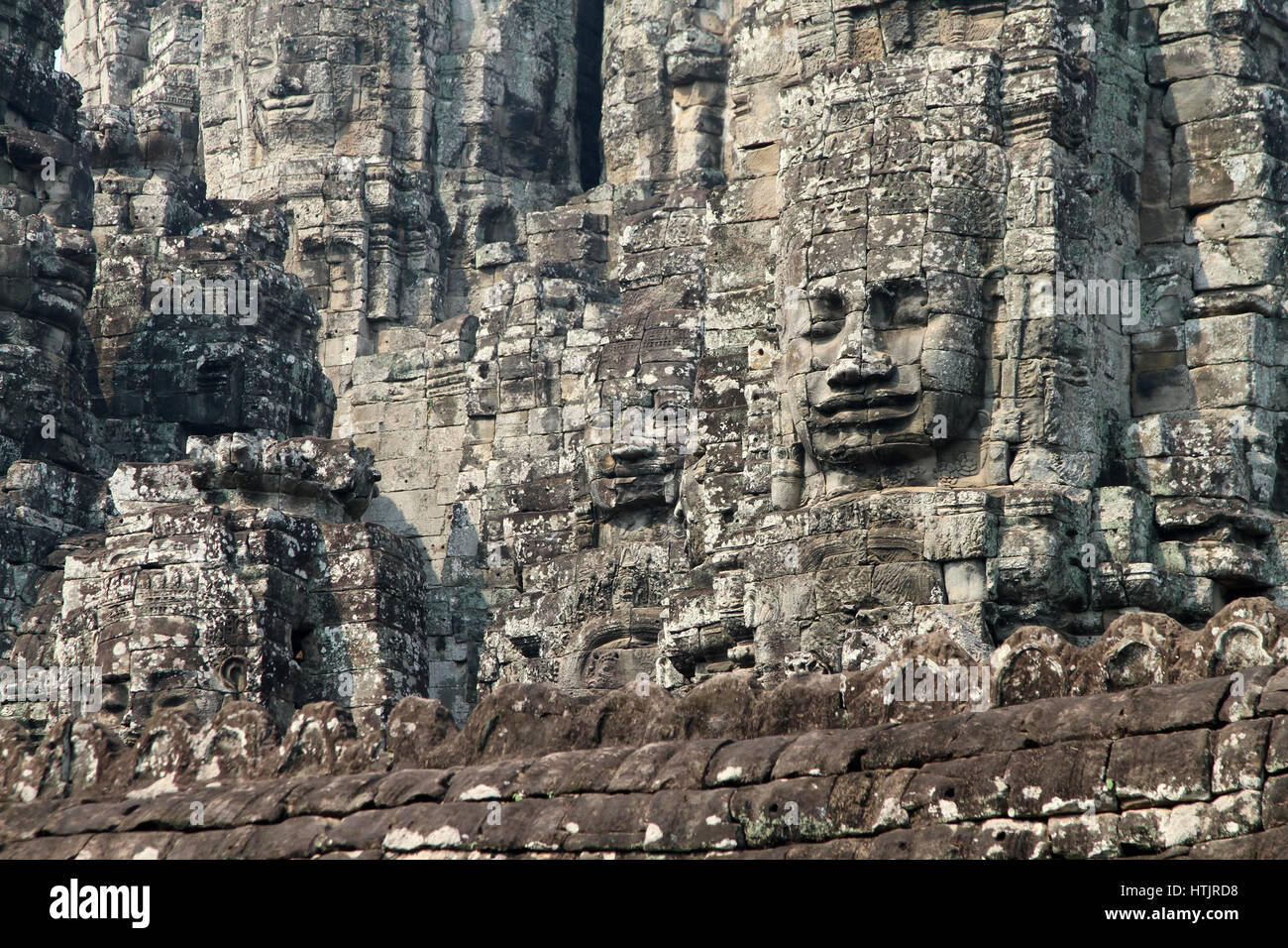 The iconic smiling faces of the Bayon temple in Angkor Thom, the former ...