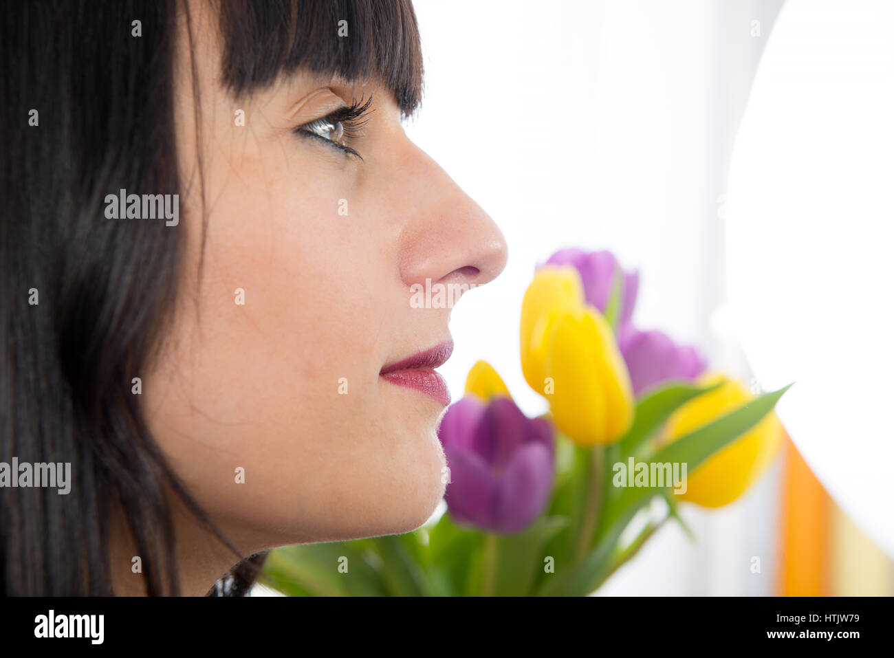 a portrait of beautiful brunette girl, side view Stock Photo - Alamy