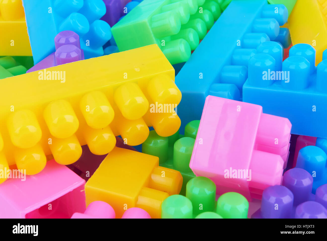 plastic toy bricks as a background Stock Photo - Alamy