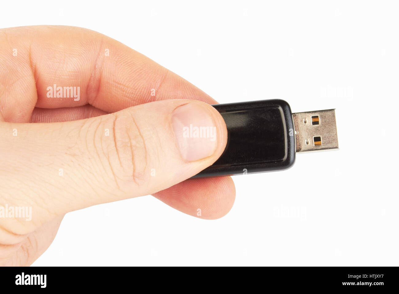USB flash card in hand isolated on white Stock Photo - Alamy