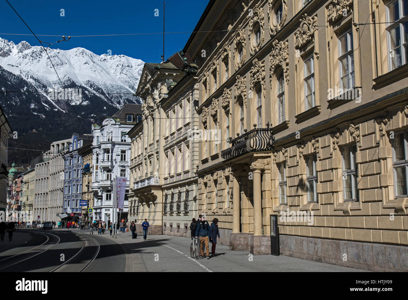 Street scenes in Innsbruck, Austria, with mountains of the Austrian ...