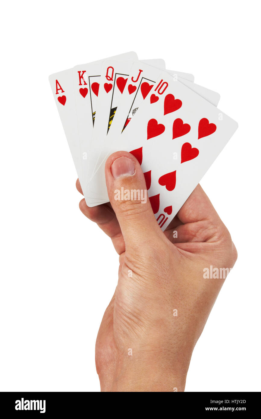 Playing cards in hand isolated on white background Stock Photo - Alamy