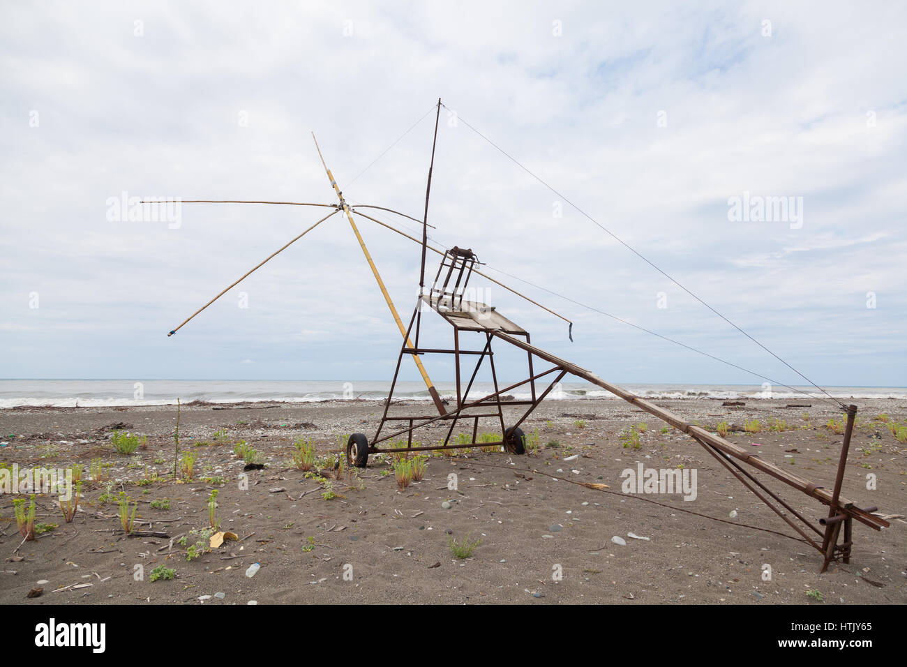The device for catching fish "spider" on the beach Stock Photo - Alamy