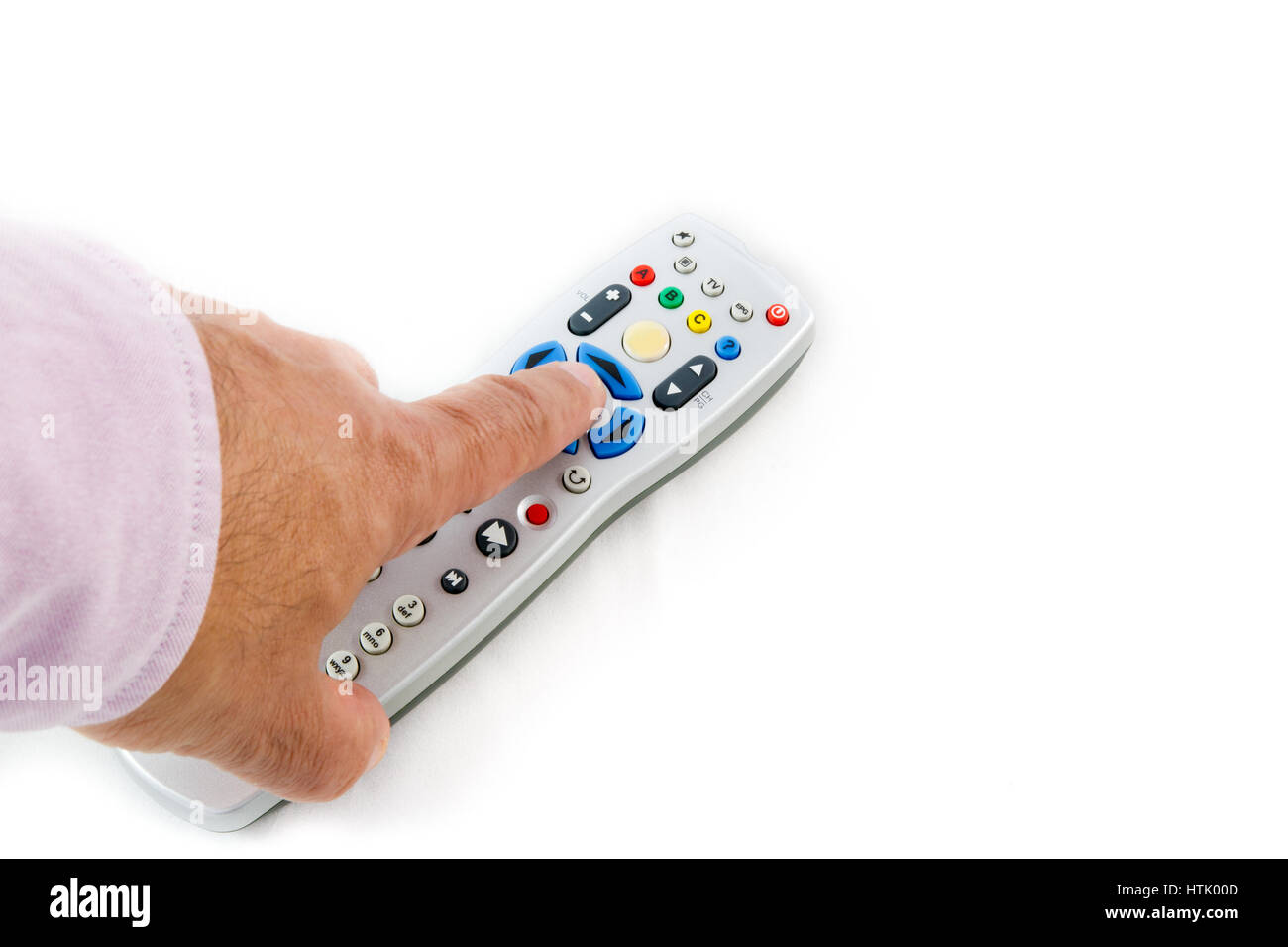 Male hand pressing silver remote control on a white background with ...