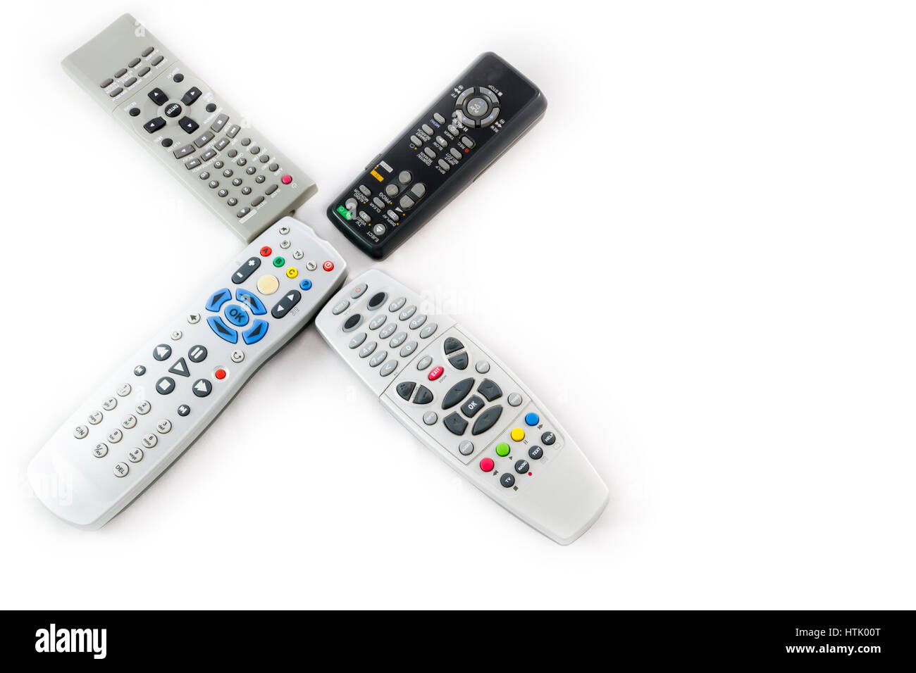 Modern and Old Remote Controls on a white background with Copy-space ...