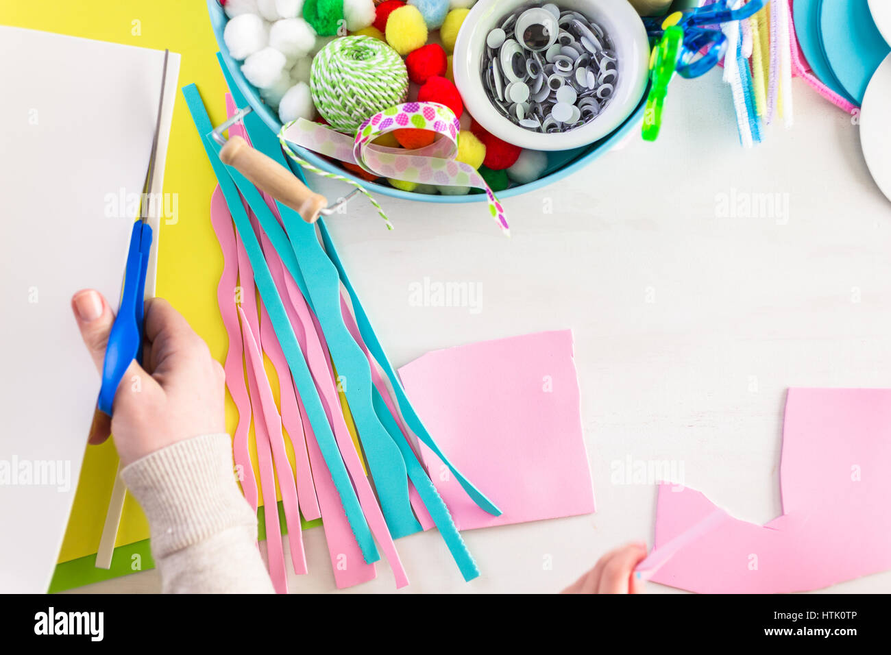 Step by step. Mother and daughter decorating paper Easter eggs Stock ...